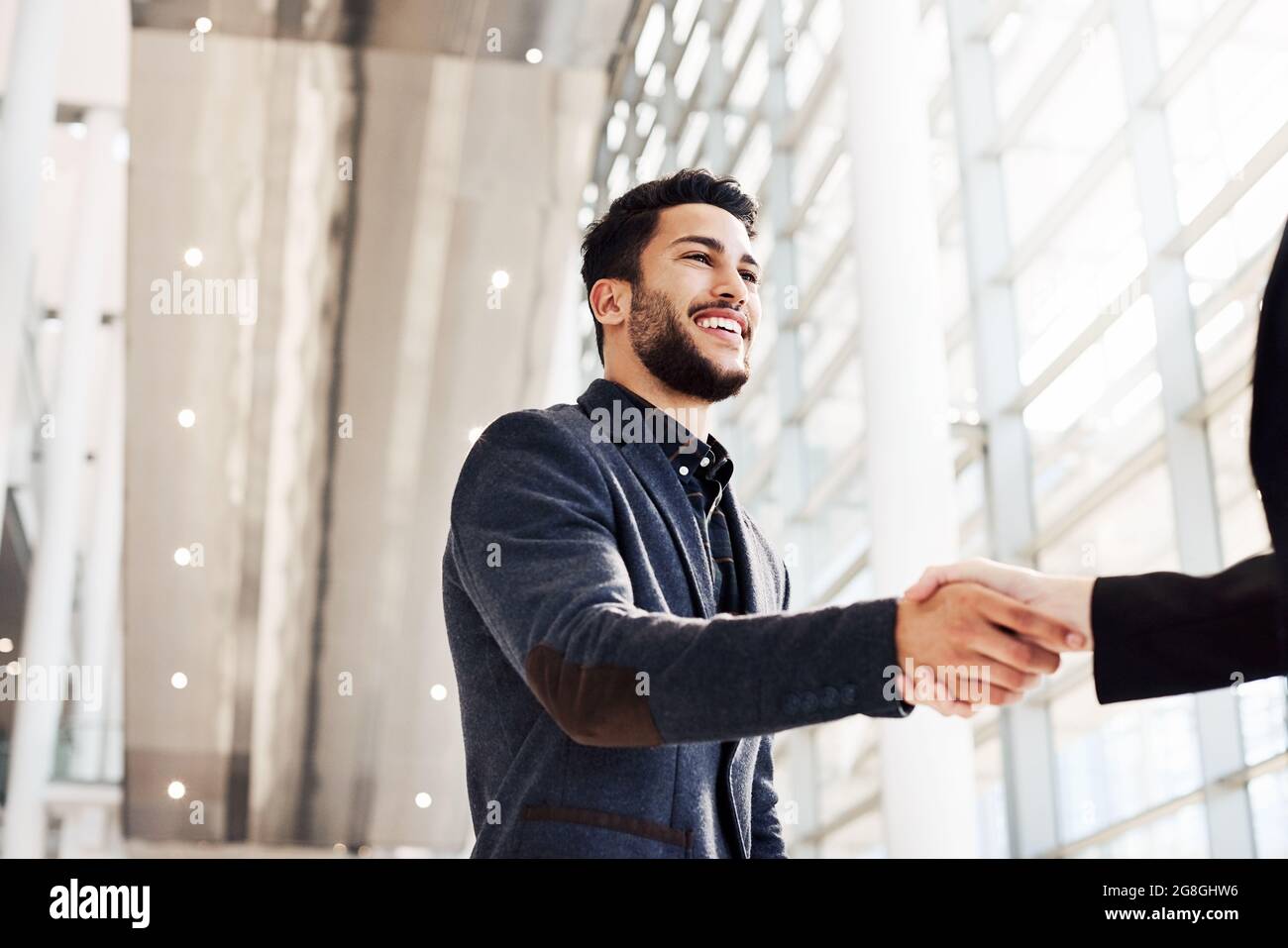All business starts with a handshake Stock Photo - Alamy