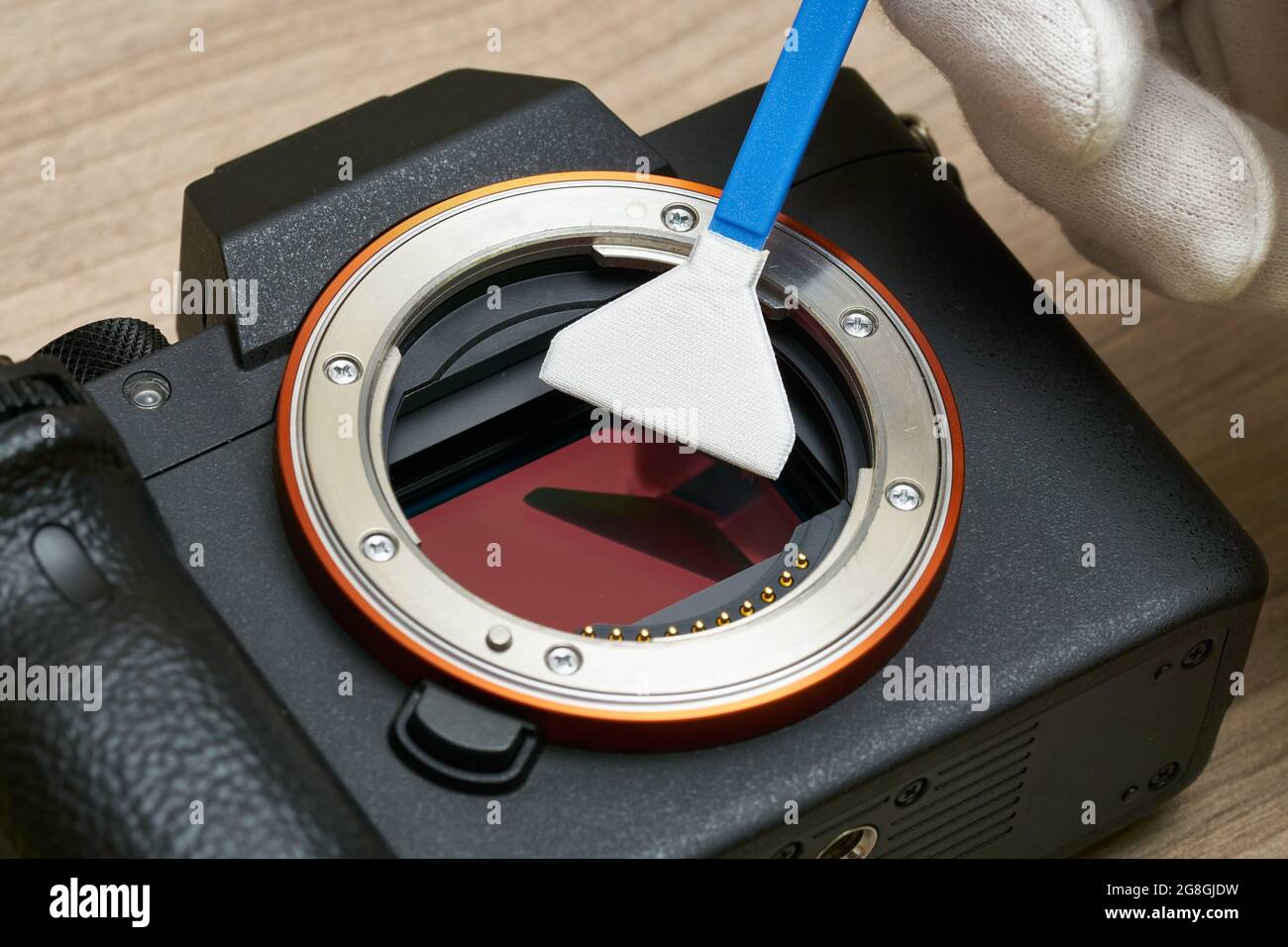Cleaning a modern digital full-frame camera sensor using a sensor swab ...