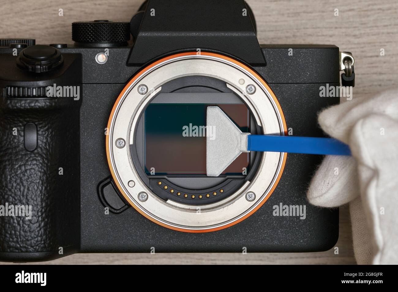 Cleaning a modern digital full-frame camera sensor using a sensor swab ...