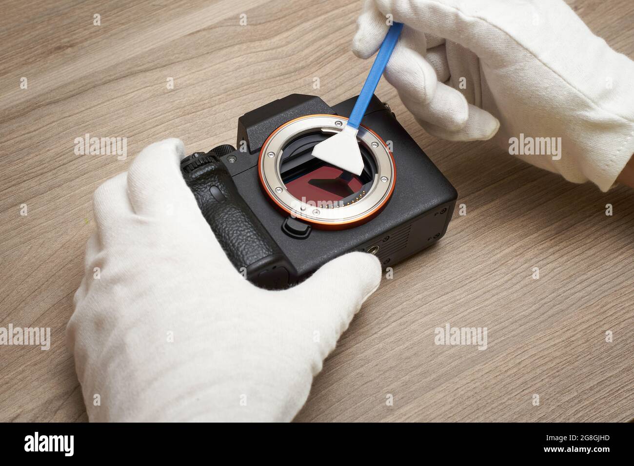 Cleaning a modern digital full-frame camera sensor using a sensor swab ...