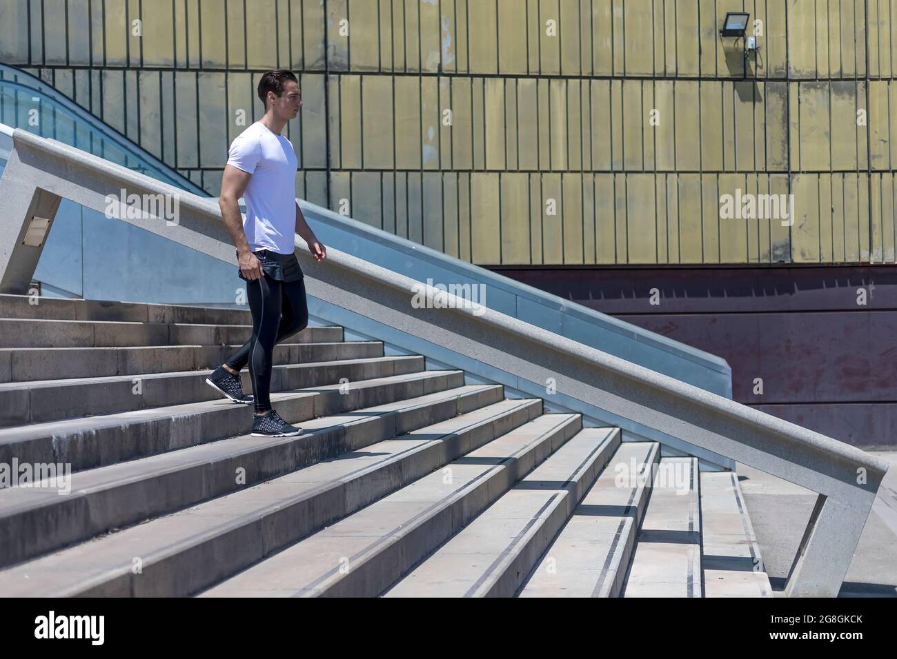 Fitness man running down stairs hi-res stock photography and images - Alamy