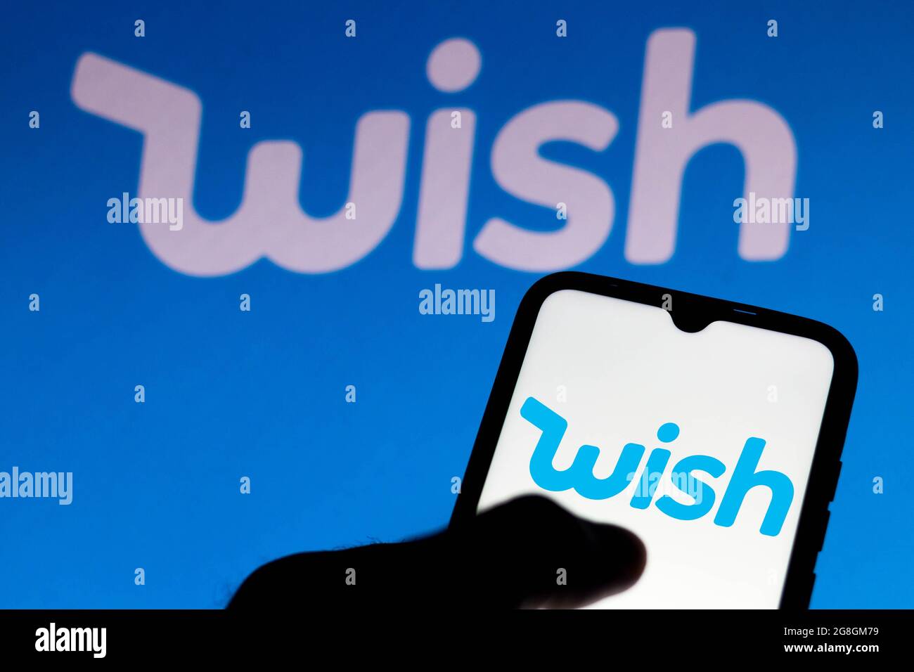 In this photo illustration the Wish logo seen on a smartphone screen ...