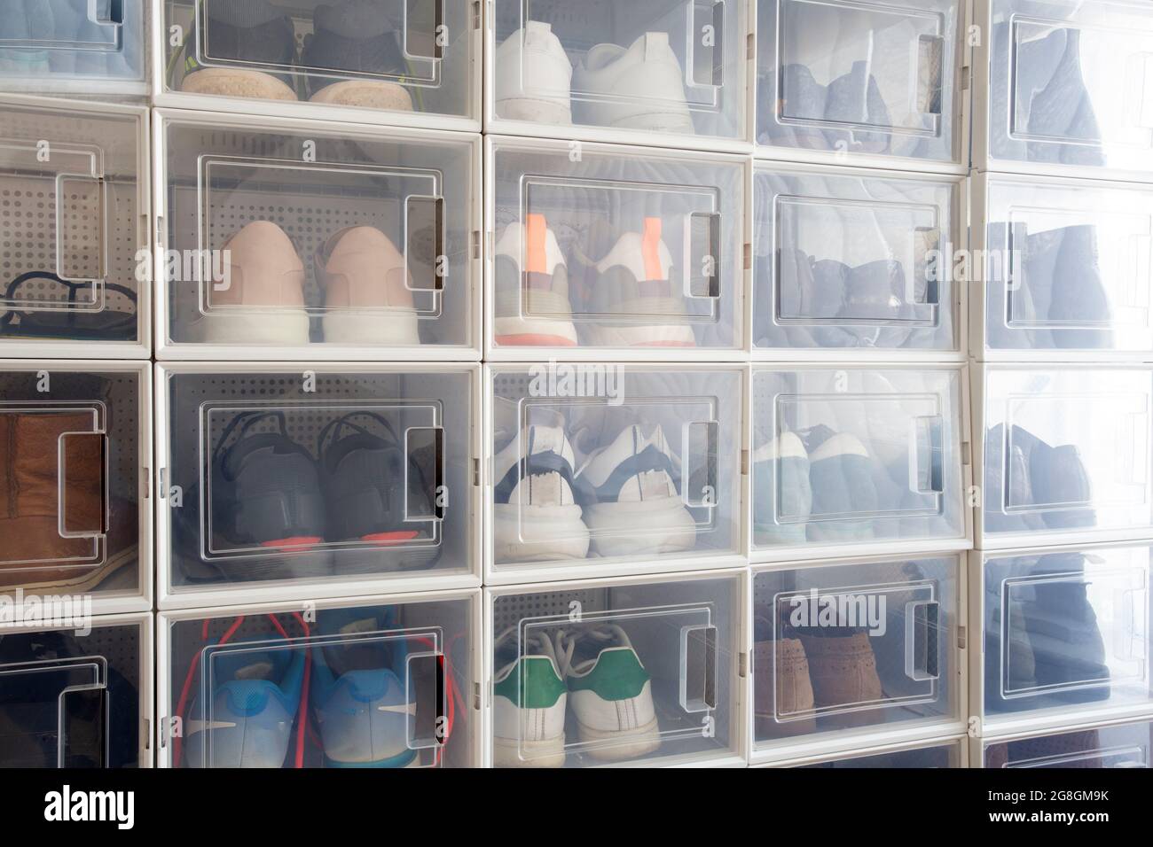 Collection of different sneakers Indoor Shoe Rack of sneakers lovers ...