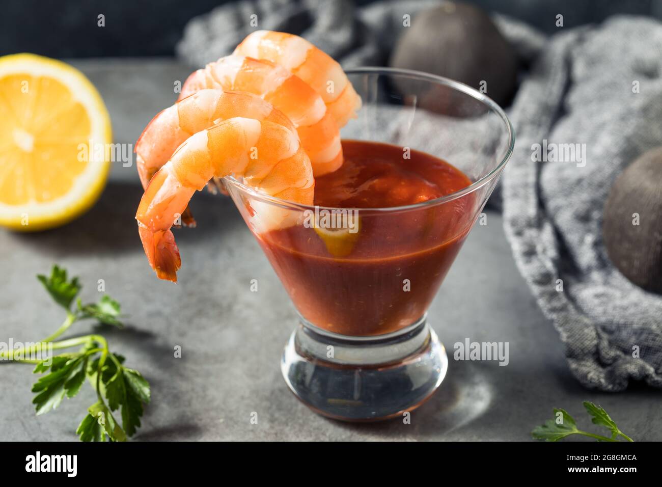 Healthy Cold Shrimp with Cocktail Sauce and Lemon Stock Photo - Alamy