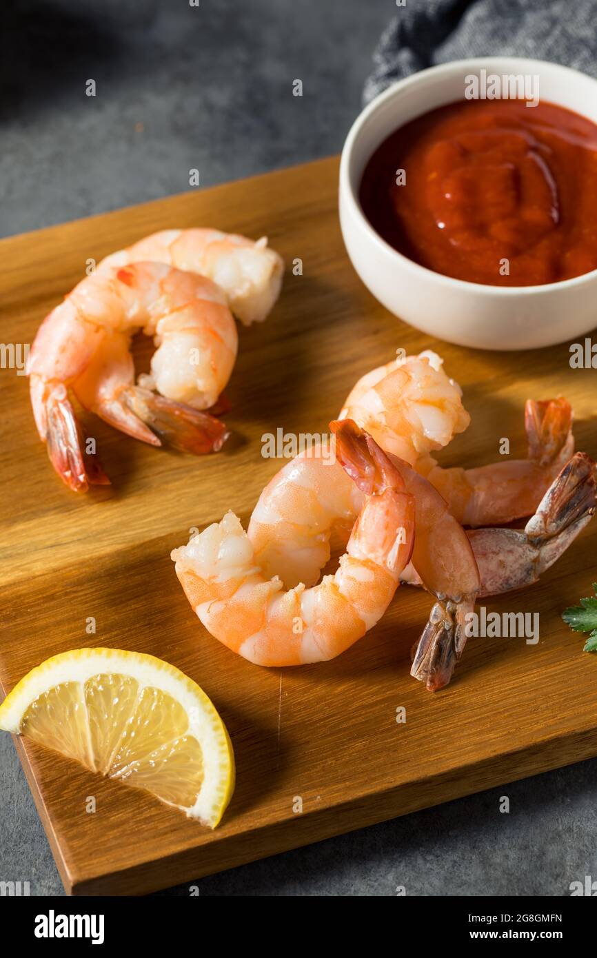Healthy Cold Shrimp with Cocktail Sauce and Lemon Stock Photo - Alamy