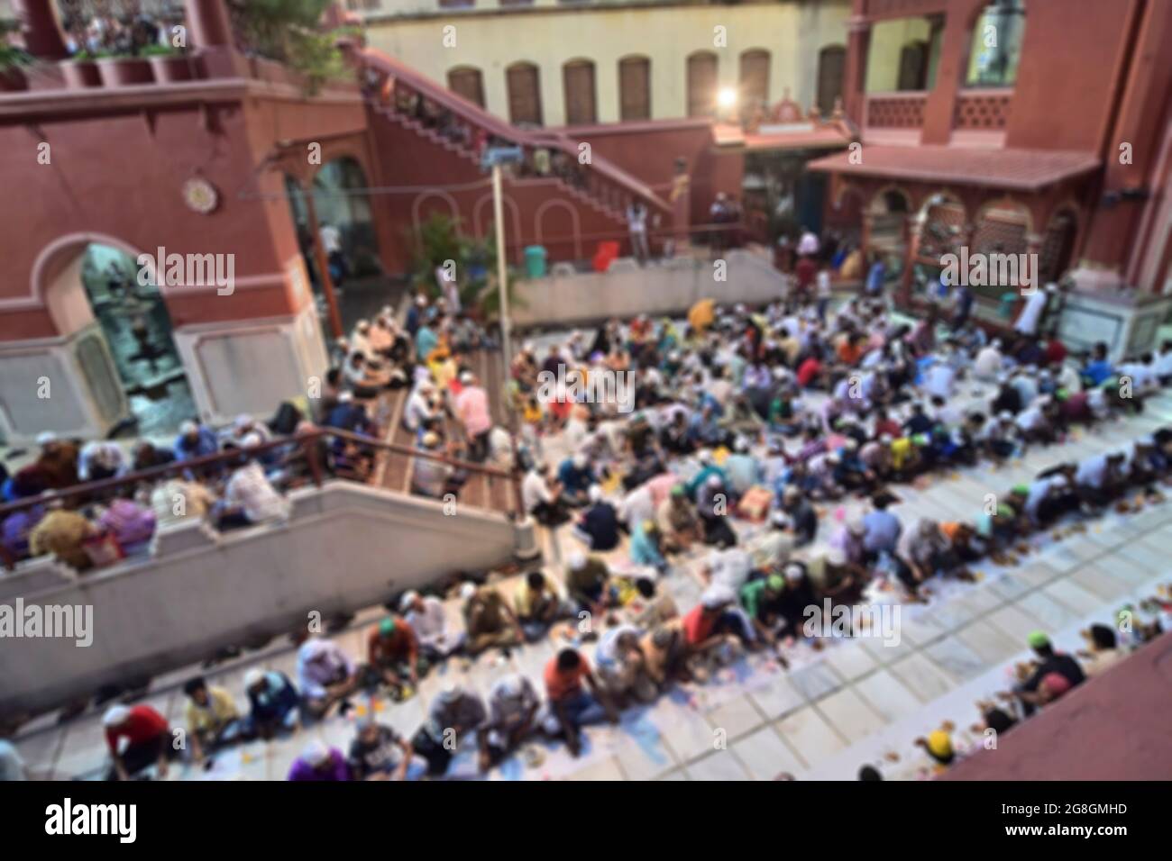 Blurred image of Iftar party at Nakhoda Masjid by Muslim community ...