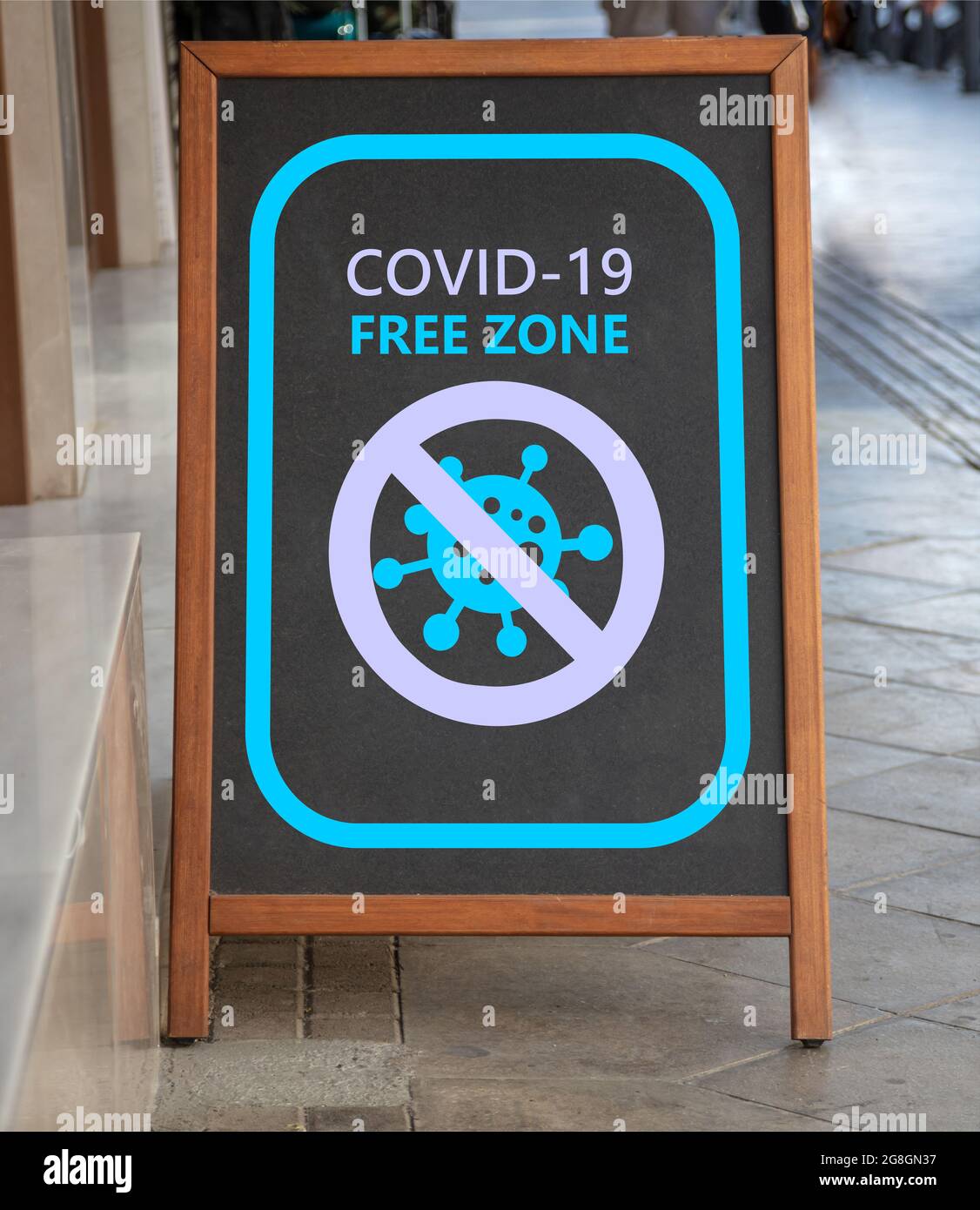 Covid free zone sign. COVID 19 FREE ZONE text label on restaurant menu ...