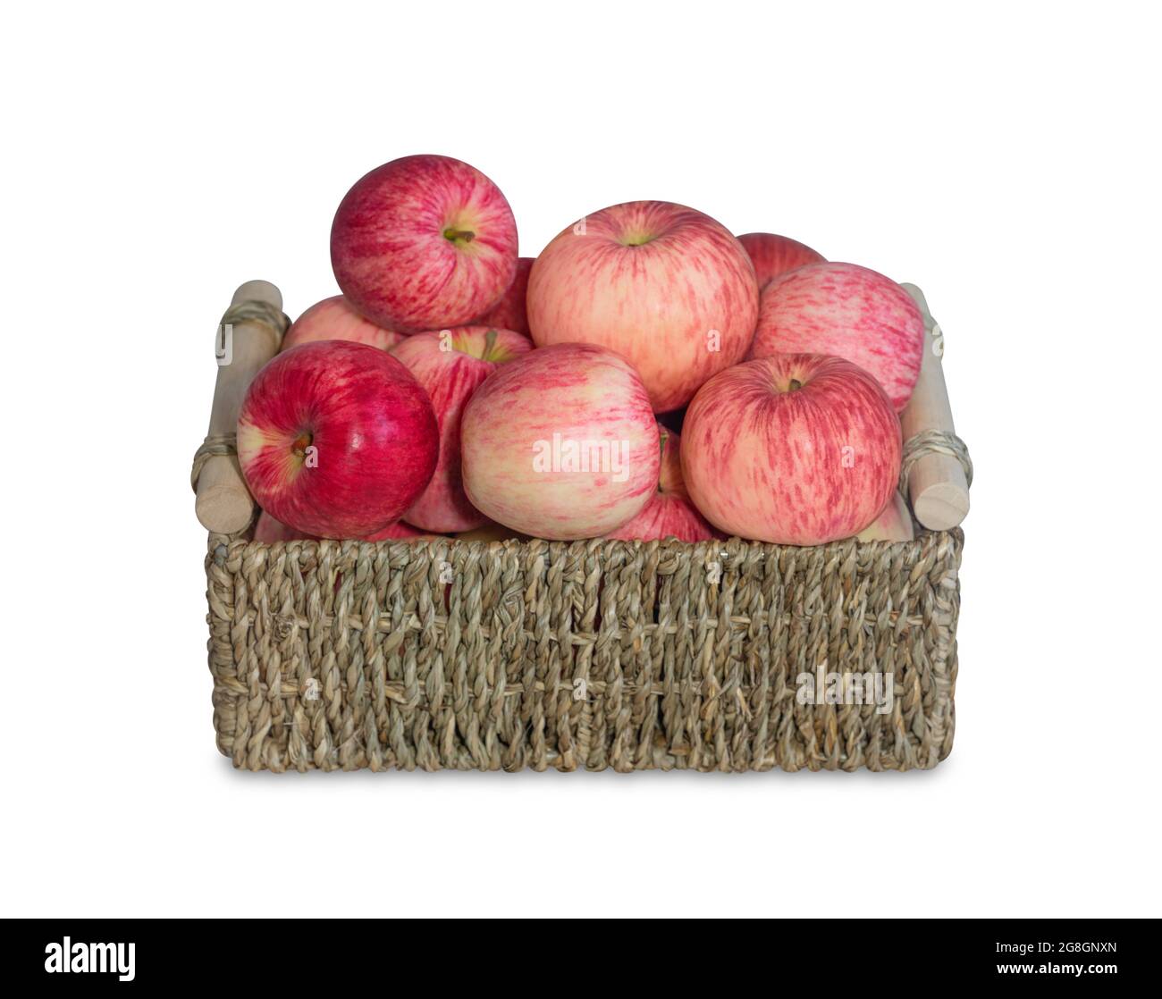Red apples in a basket are isolated on a white background. Fresh juicy apples fruits. Autumn ...