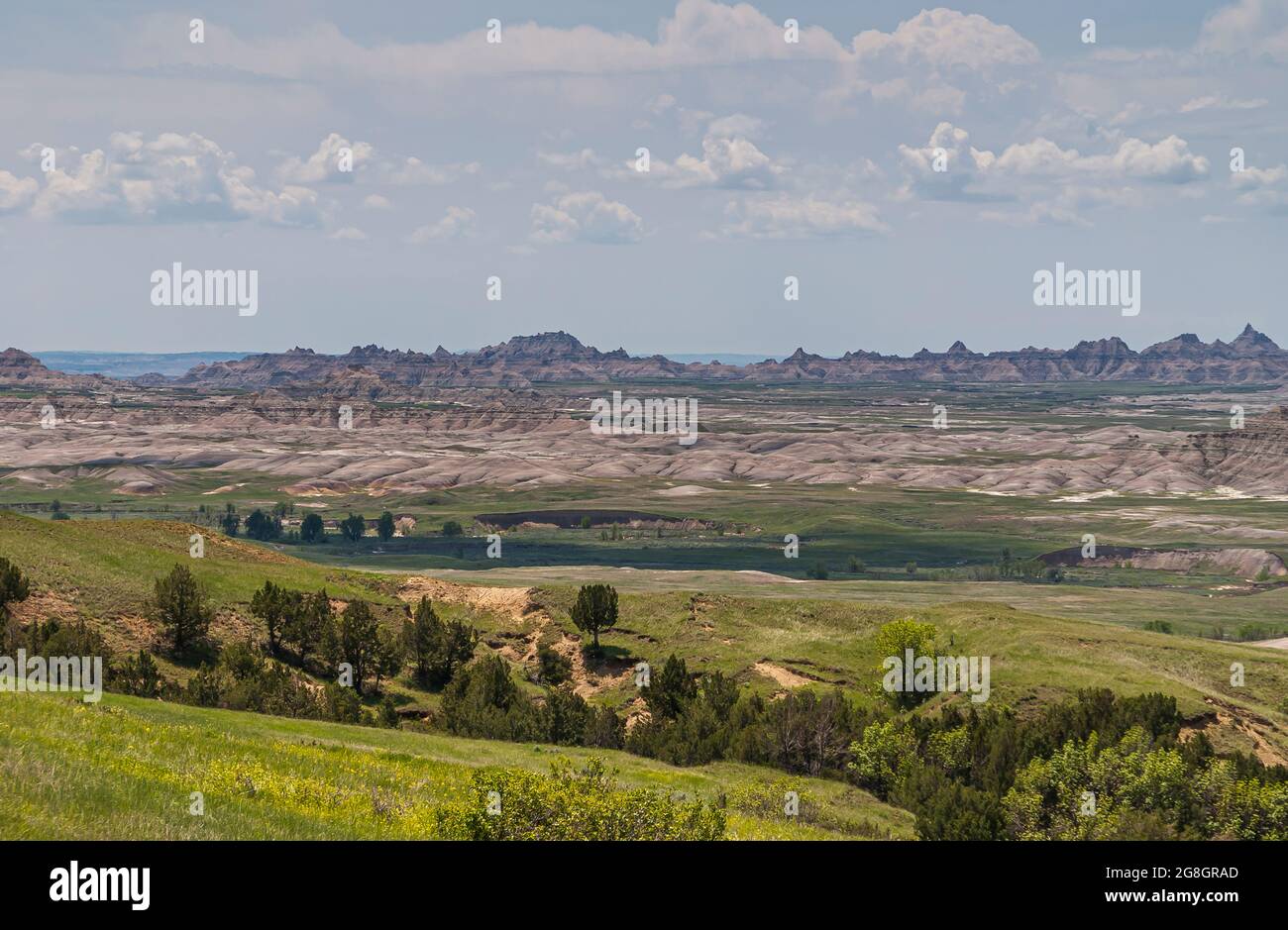 Badlands National Park, SD, USA - June 1, 2008: Green landscape with ...
