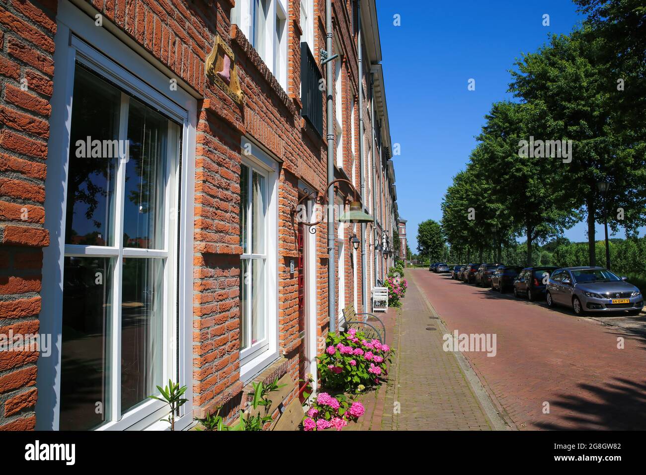 Helmond, Netherlands - July 10. 2021: View on street with red asphalt ...