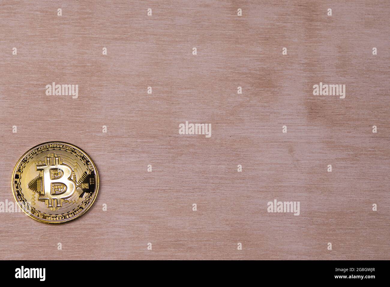 Bitcoin $ gold coin on white wood table. Nice copy space for your ...