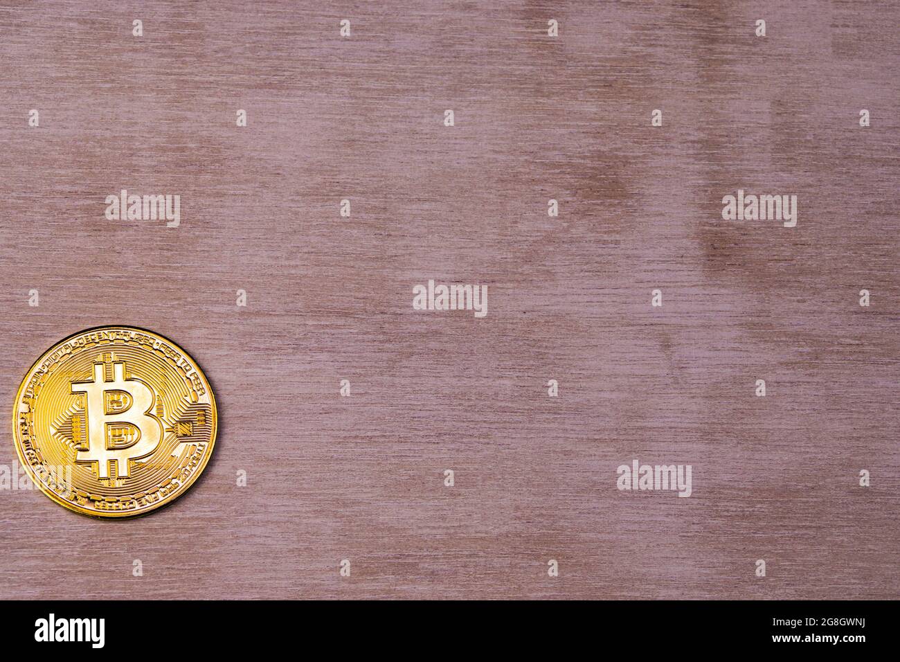 Bitcoin $ gold coin on white wood table. Nice copy space for your ...