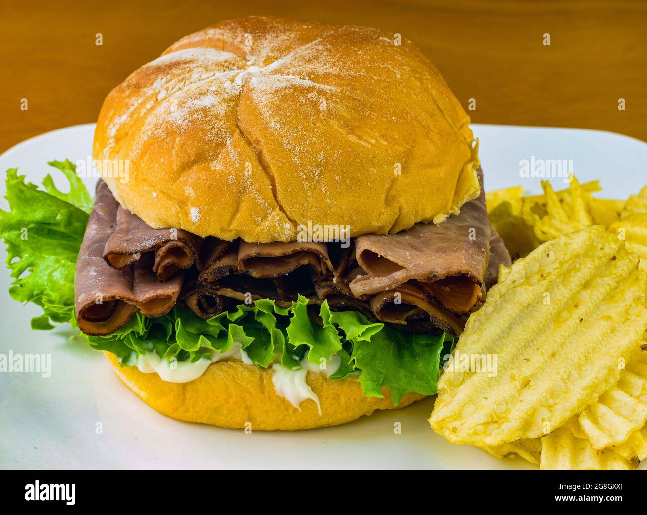 roast beef resting on lettucebetween a bulkie roll Stock Photo - Alamy