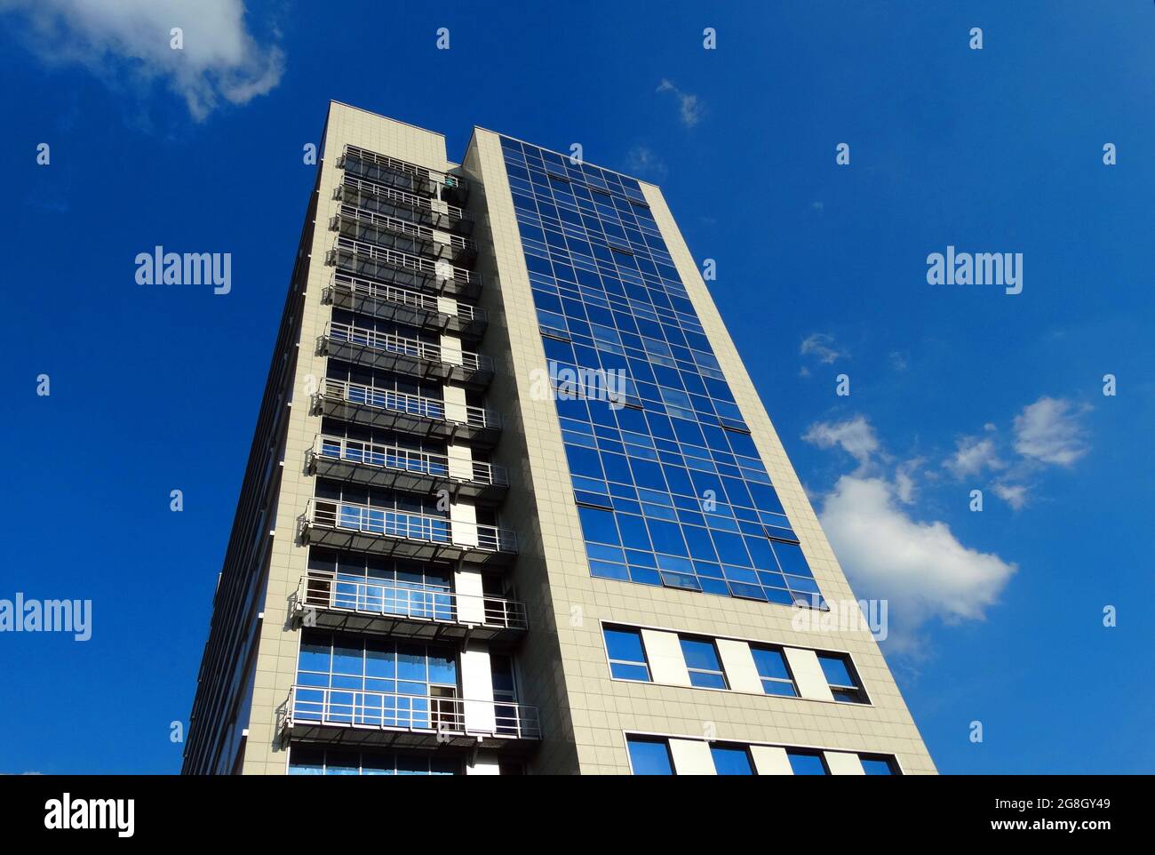 A fragment of a modern office building with many windows Stock Photo ...