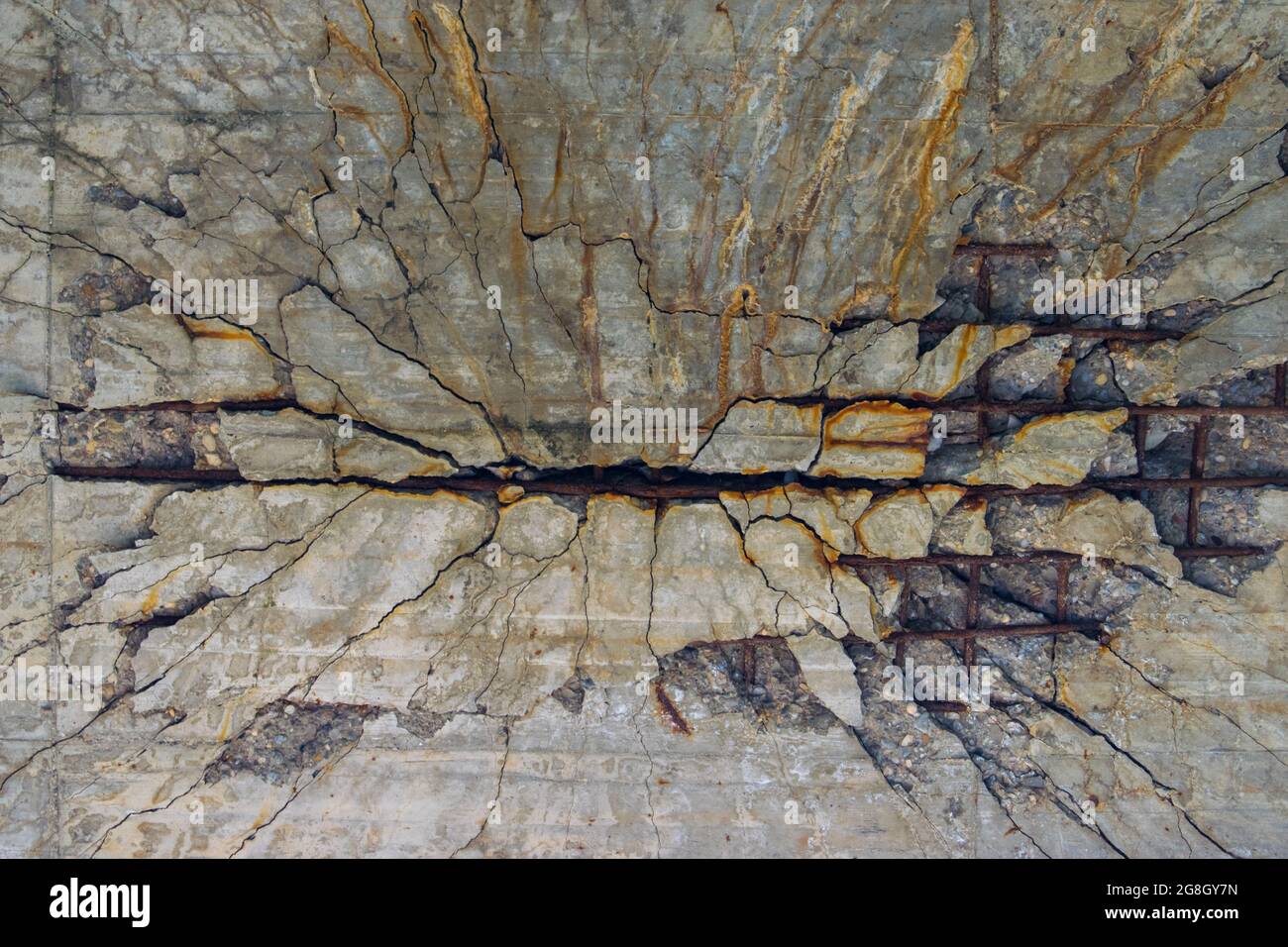 Crack in a concrete massive crack. Something exploded on the other side ...