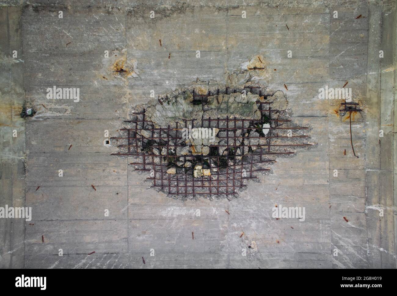 Crack in a concrete massive crack. Something exploded on the other side ...