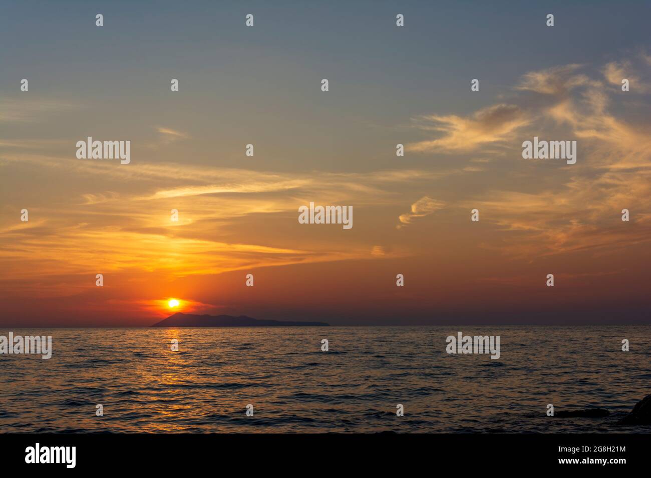 Beautiful sunset at Logas beach at Peroulades village of Corfu island ...
