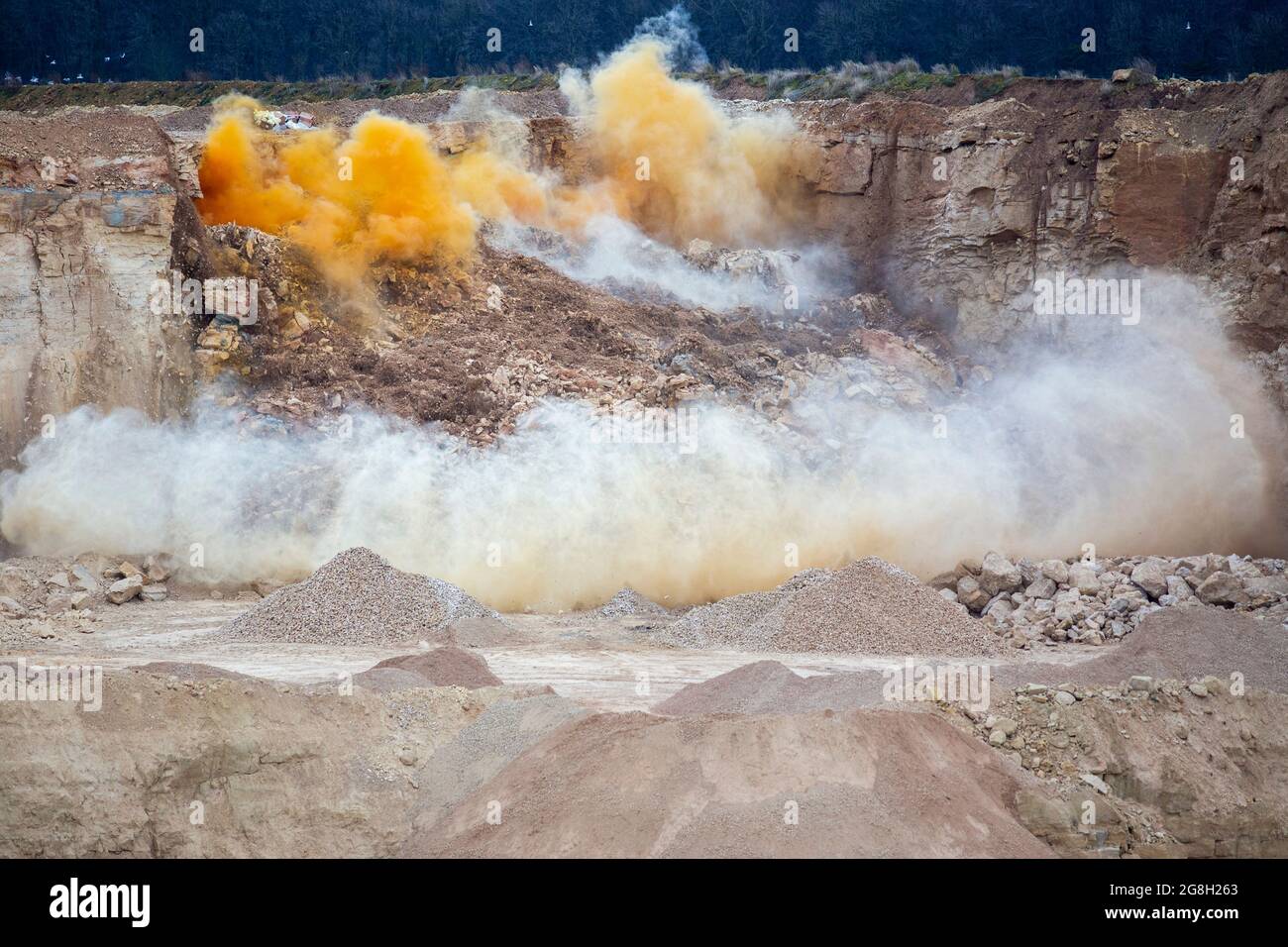 A controlled explosion at a gravel quarry, England, UK Stock Photo - Alamy