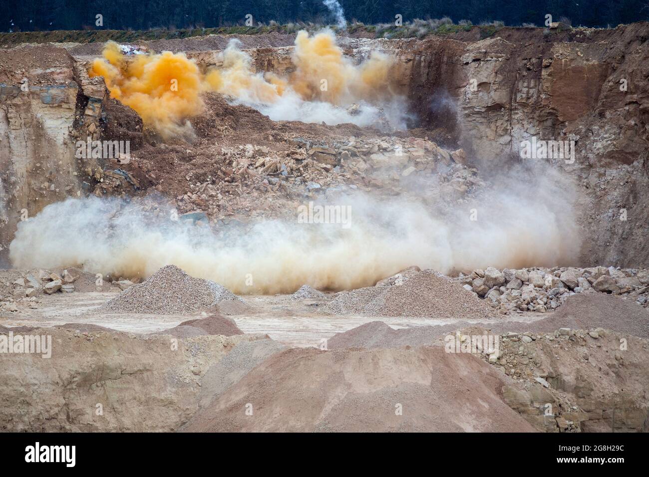 A controlled explosion at a gravel quarry, England, UK Stock Photo - Alamy