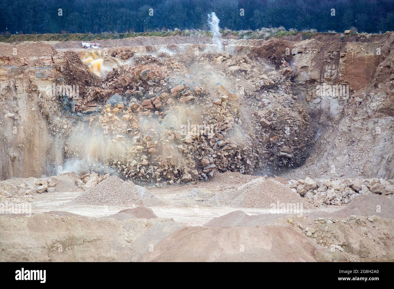 A controlled explosion at a gravel quarry, England, UK Stock Photo - Alamy
