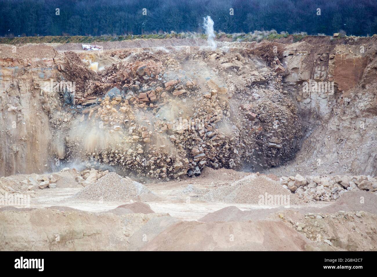A controlled explosion at a gravel quarry, England, UK Stock Photo - Alamy