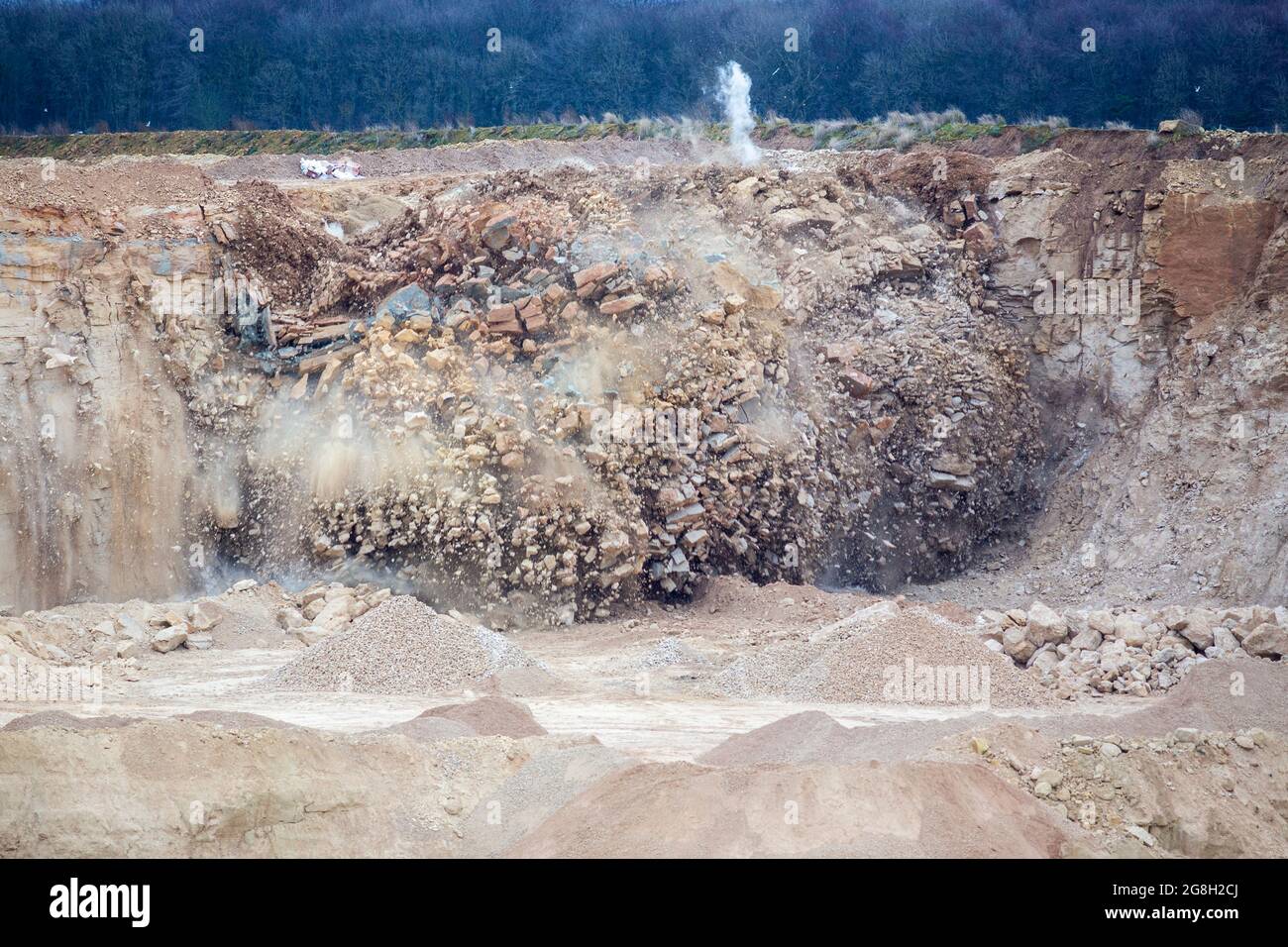 A controlled explosion at a gravel quarry, England, UK Stock Photo - Alamy
