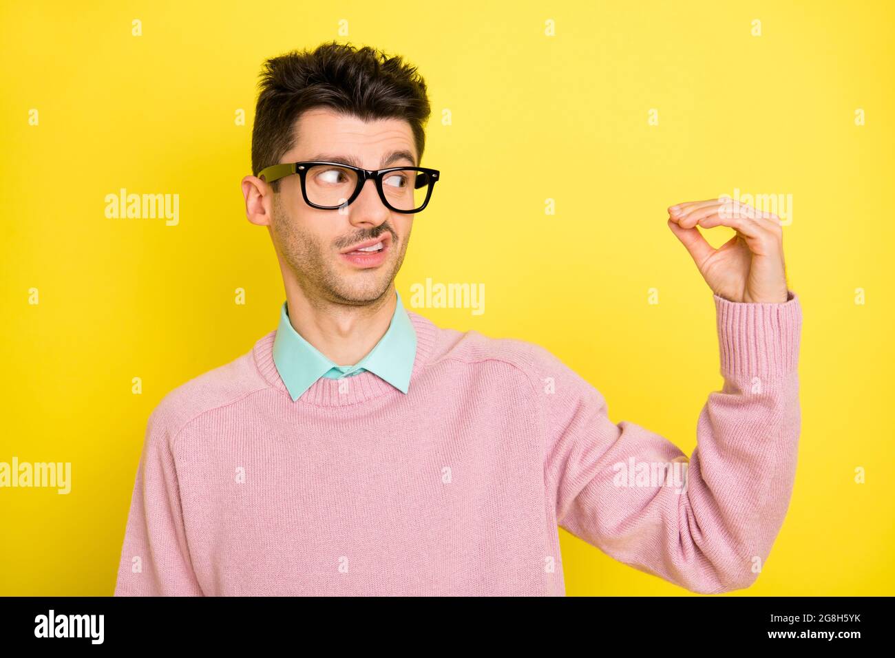 Photo of young unhappy upset uncertain doubtful man in glasses speak ...