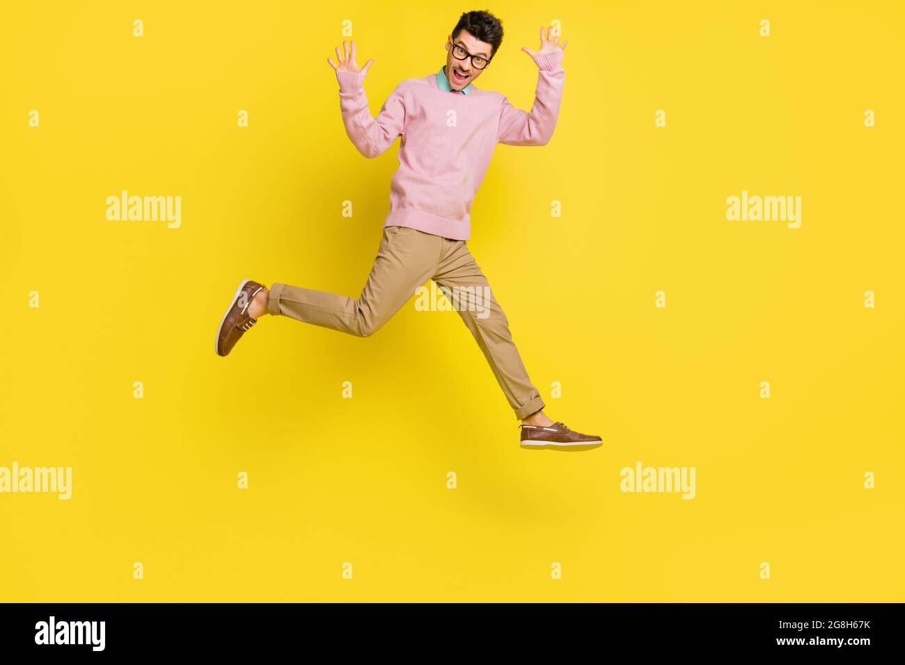 Full size photo of young cheerful man happy excited have fun jump up ...