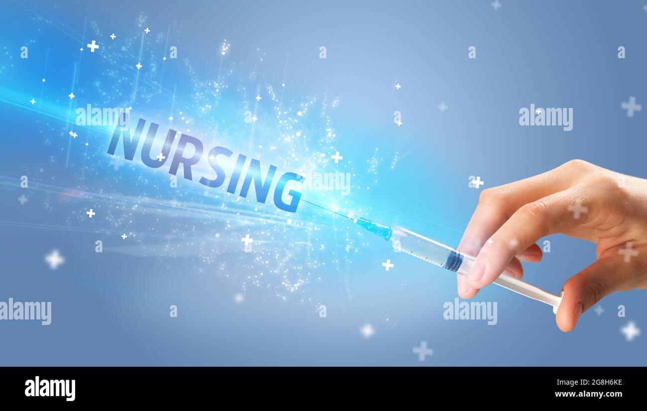 Syringe, medical injection in hand Stock Photo - Alamy