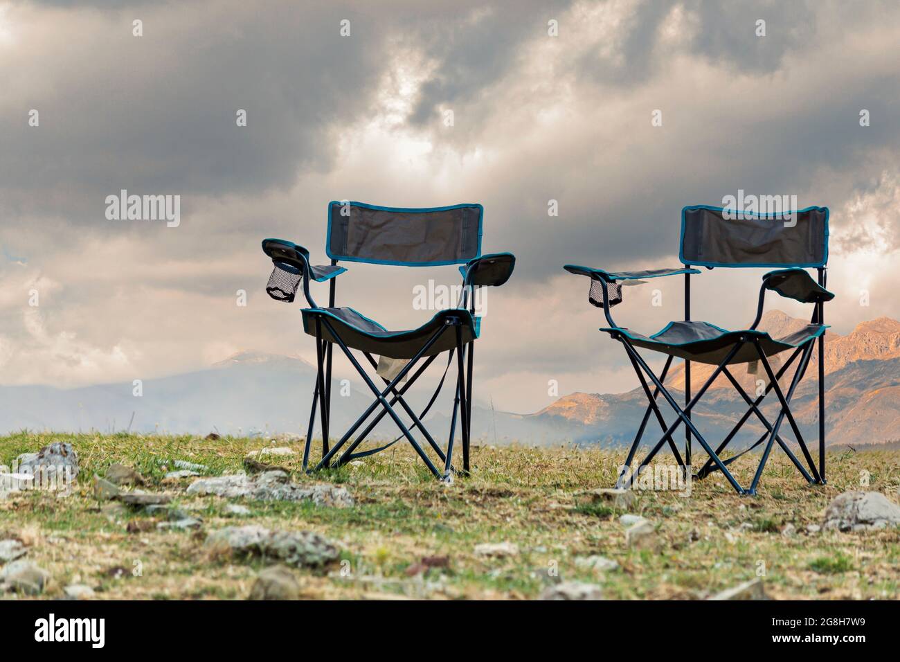 2 empty outdoor chairs in mountainous terrain. Picnic Chair Stock Photo ...