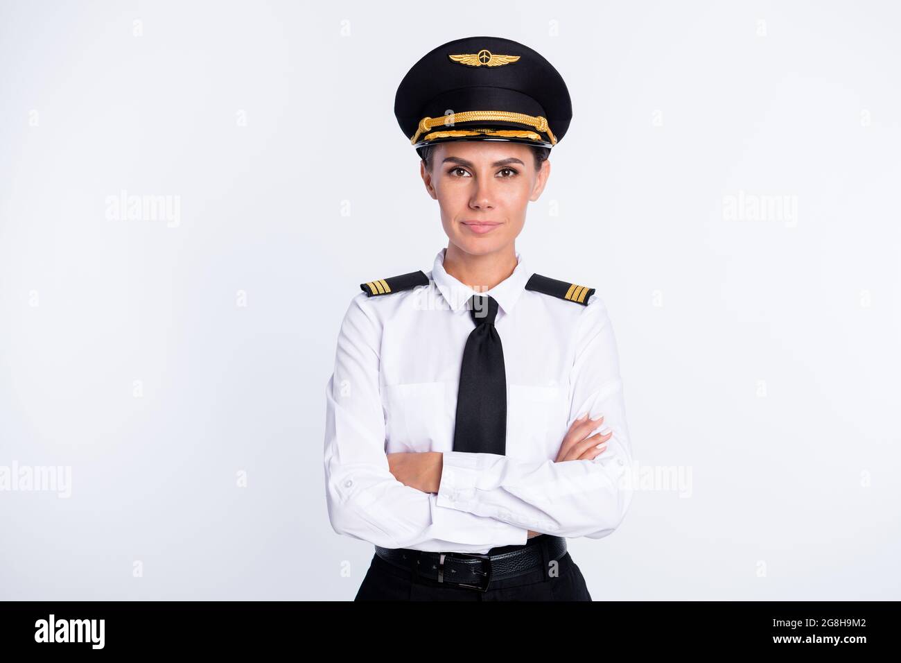Photo of lovely successful pilot lady folded hands wear hat aviator ...