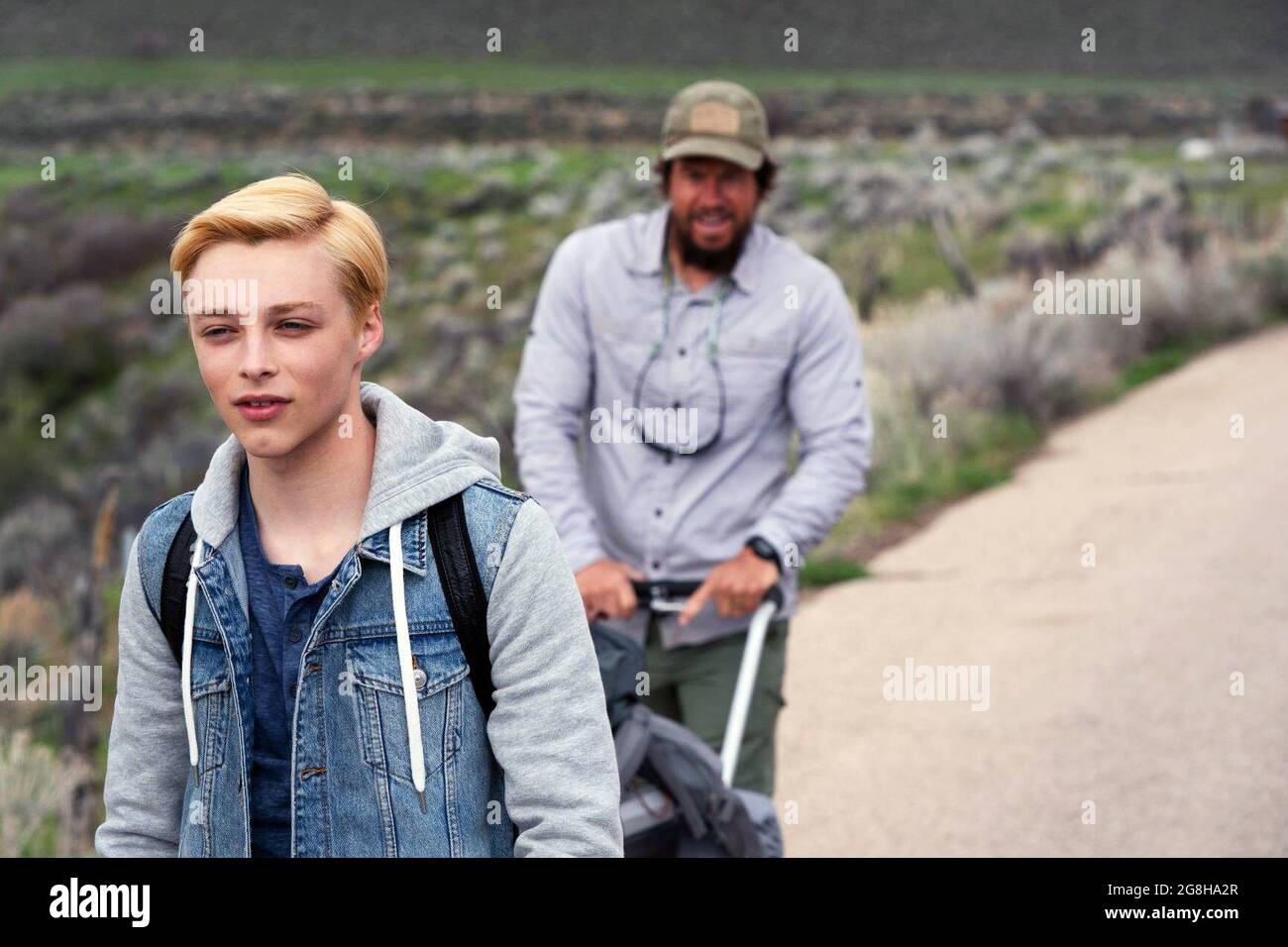 JOE BELL, from left: Reid Miller, Mark Wahlberg, 2020. ph: Quantrell D ...