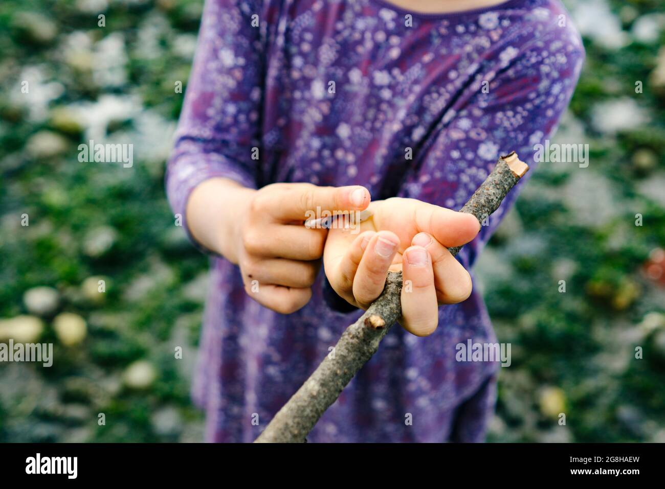 Girl with a stick hi-res stock photography and images - Alamy