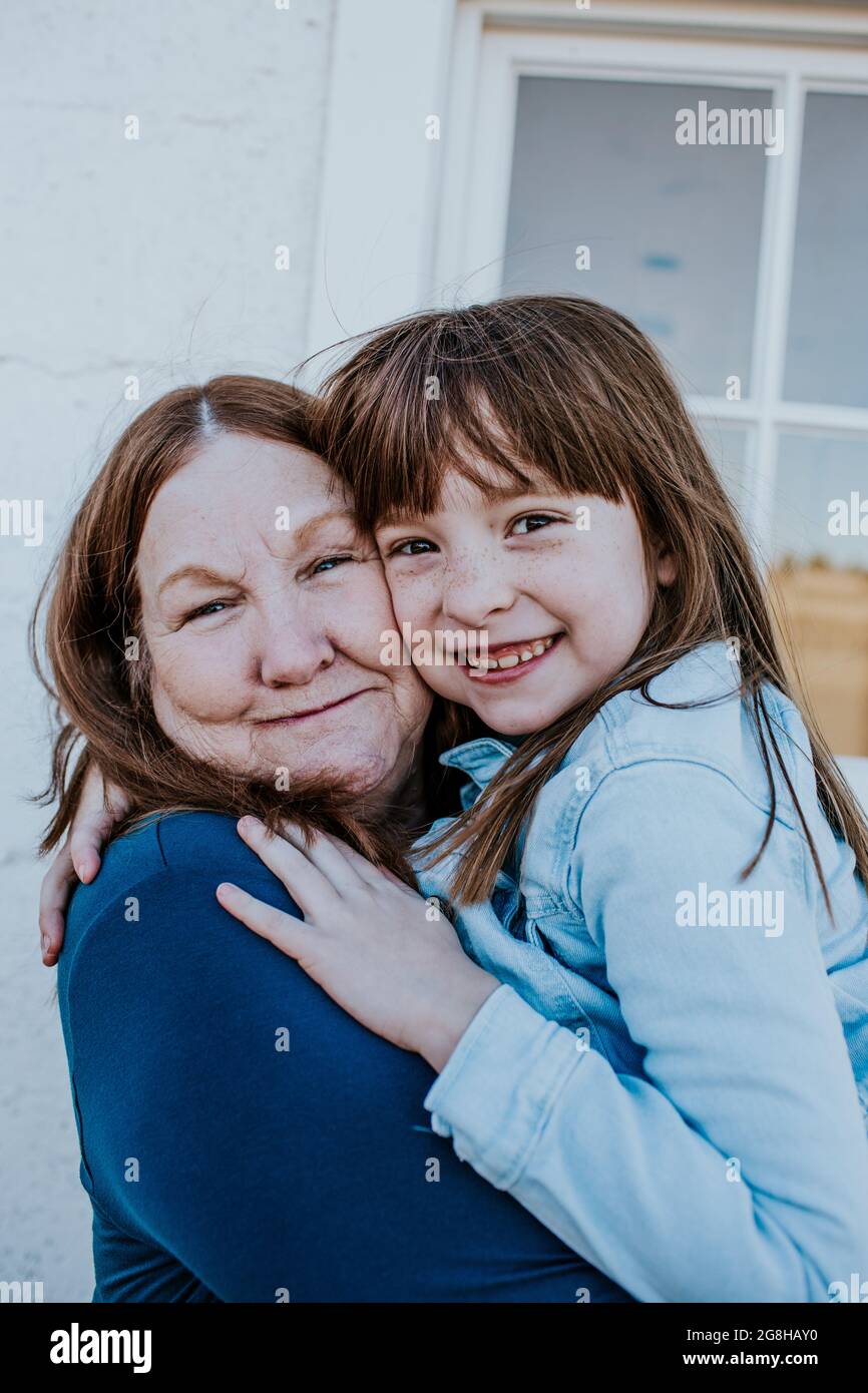 Baby hugging grandma hi-res stock photography and images - Alamy