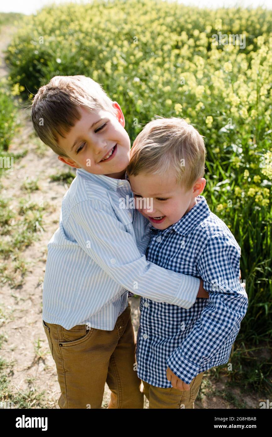 Two Boys Brothers Hugging