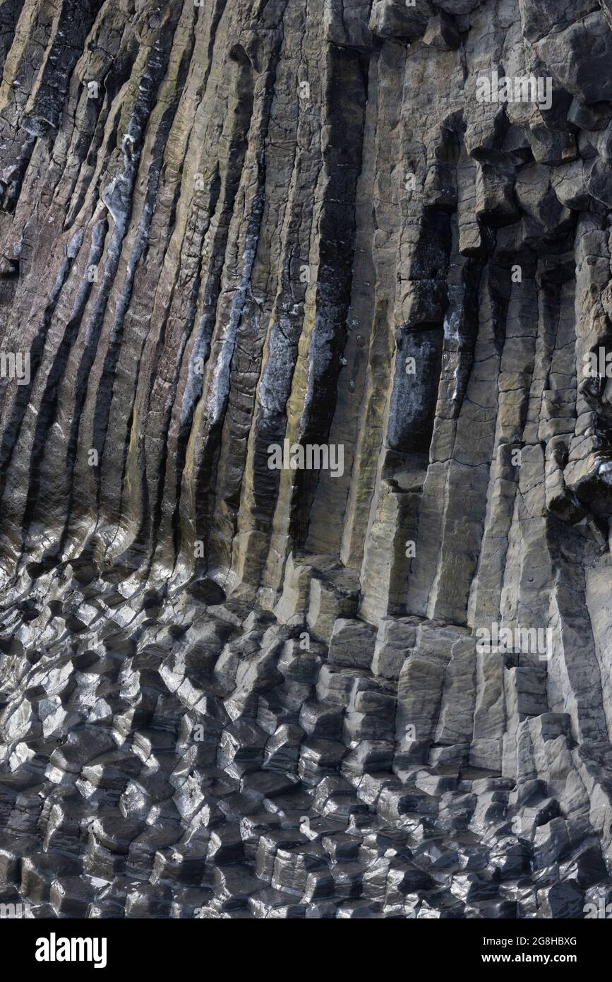 basalt columns on the cliffs of the village of Arnastapi Stock Photo ...