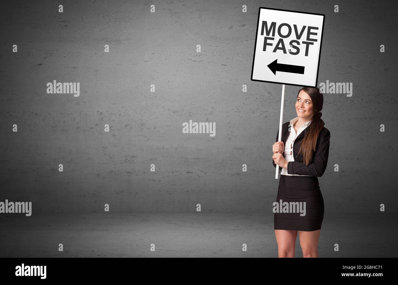 business person holding a traffic sign Stock Photo - Alamy