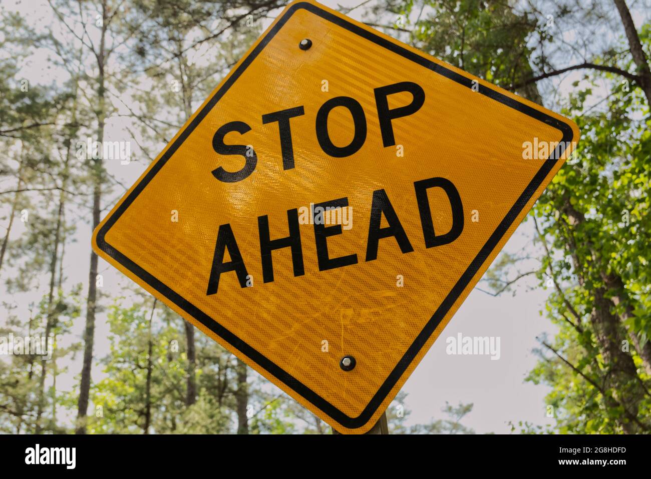 Black and yellow screen sign Stop Ahead in rural Georgia Stock Photo ...