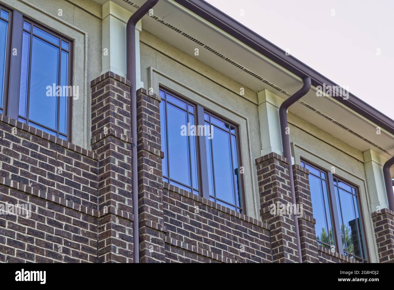 Close up vintage style brick facade and glass windows top view Stock ...