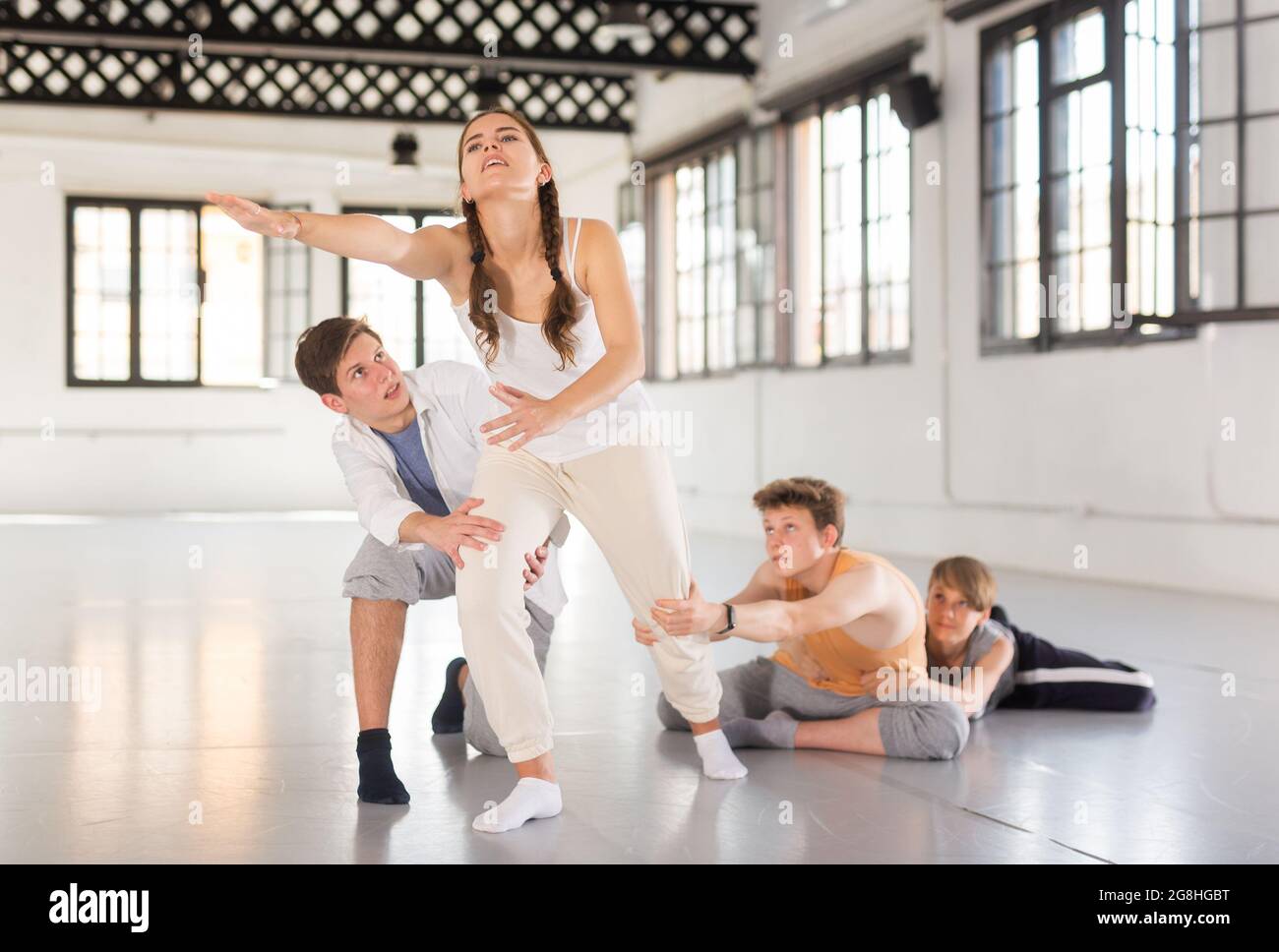 Young people rehearsing scene Stock Photo - Alamy