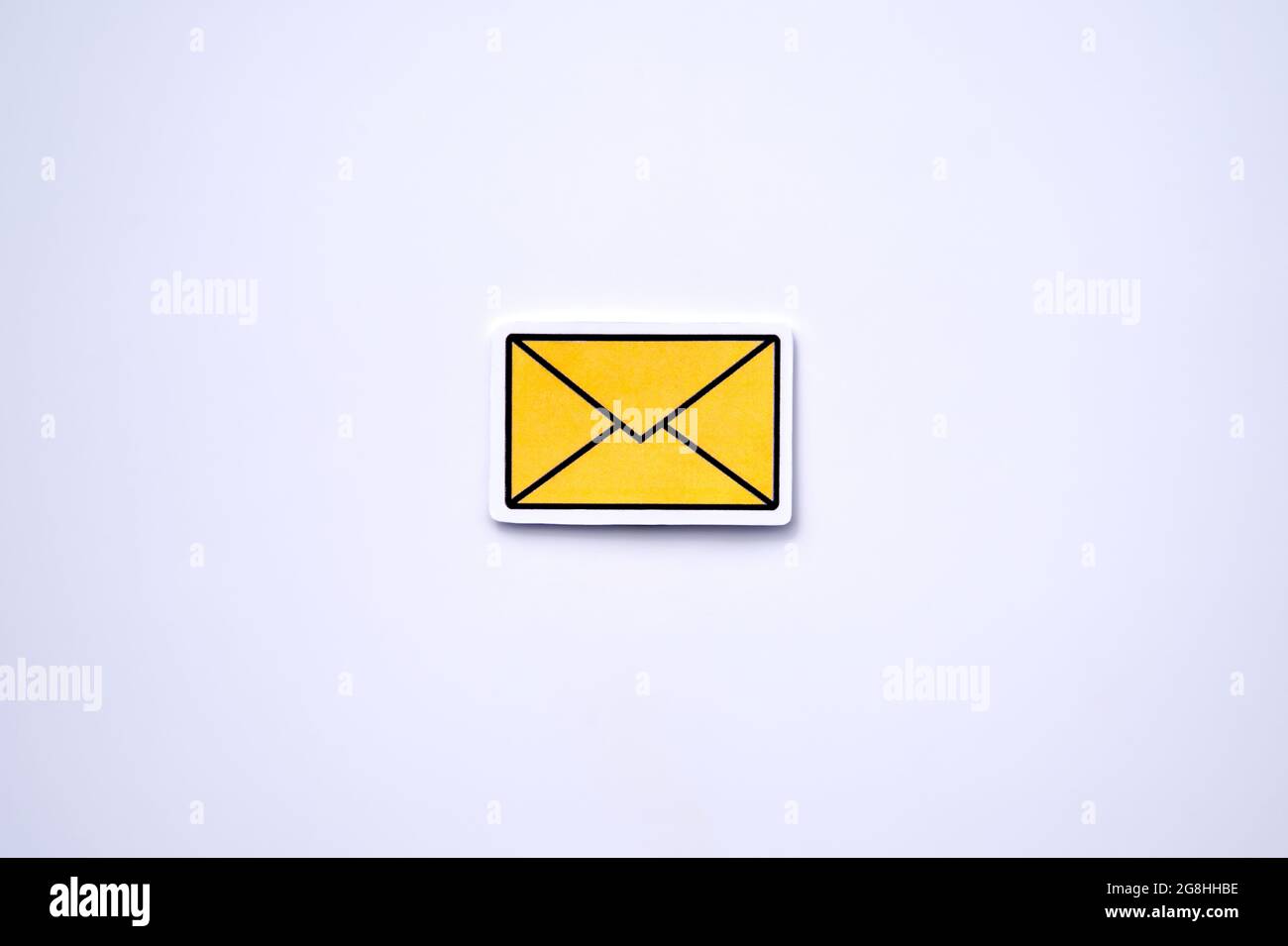 Yellow message sign or envelope icon against a white background Stock ...