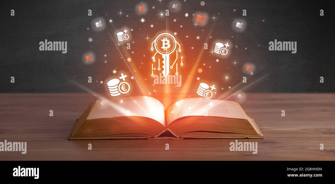 Open book with currency icons above Stock Photo - Alamy