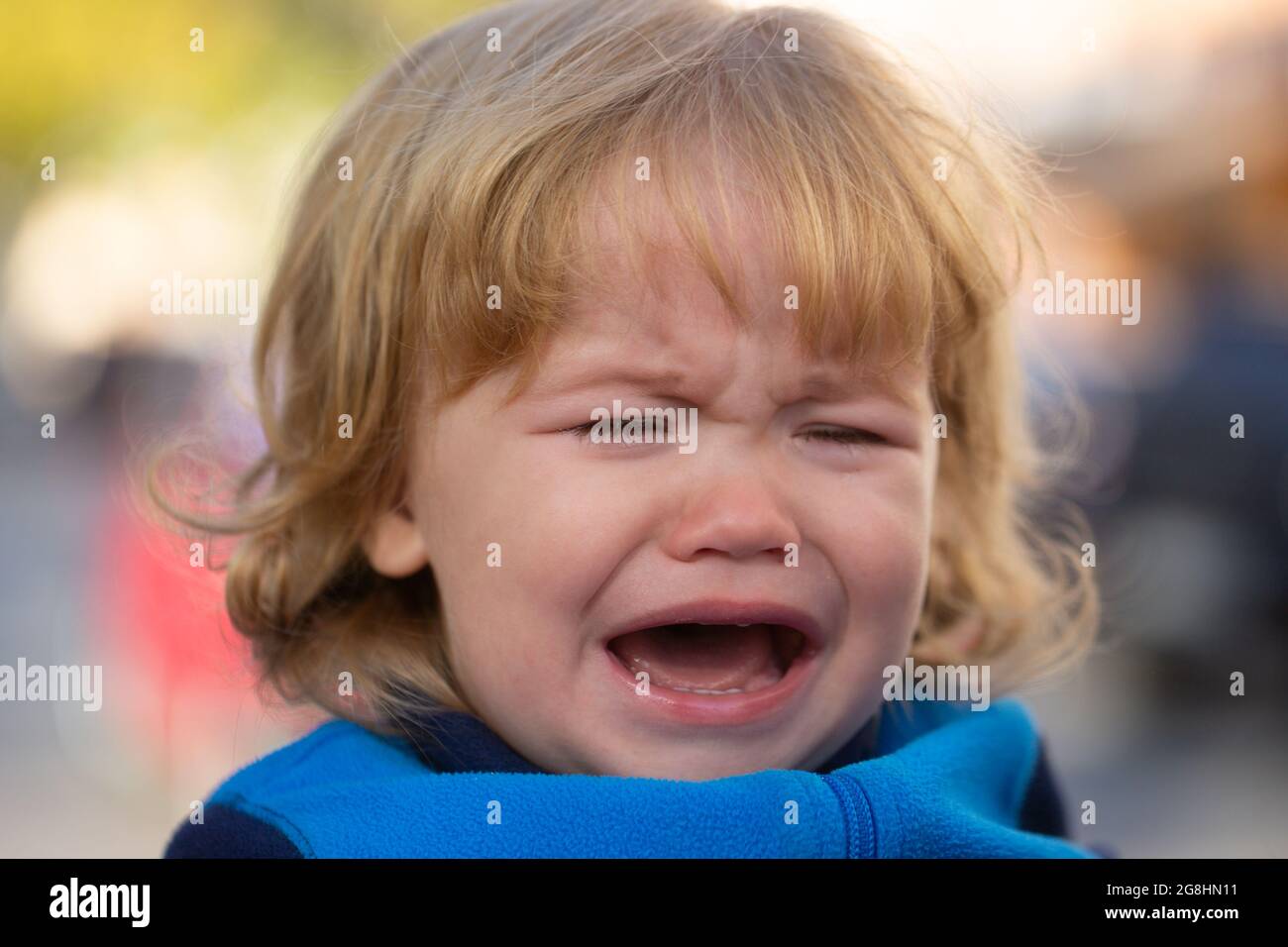 Baby cry. Close up portrait of a crying kid Stock Photo - Alamy