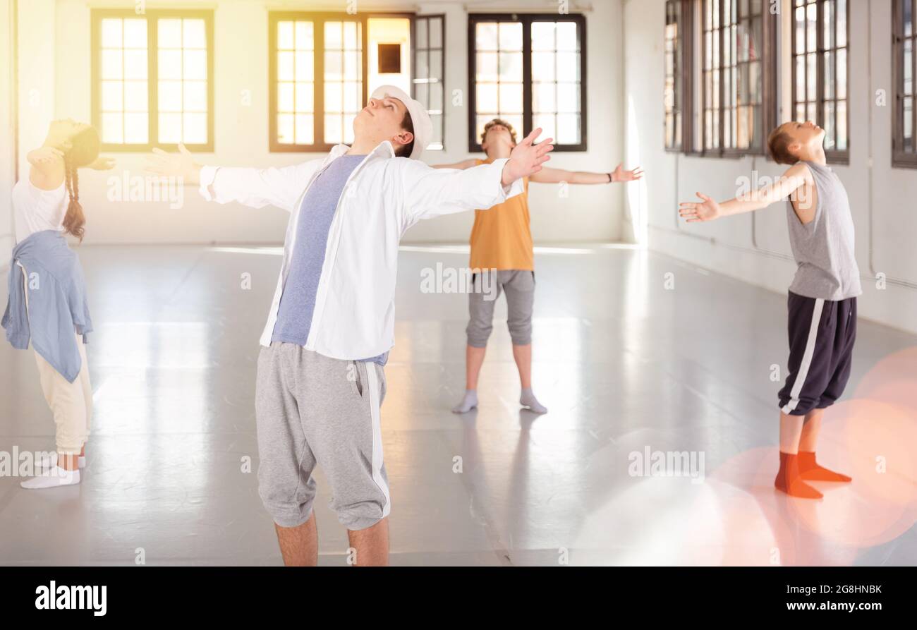 Teenagers performing unusual dance Stock Photo - Alamy