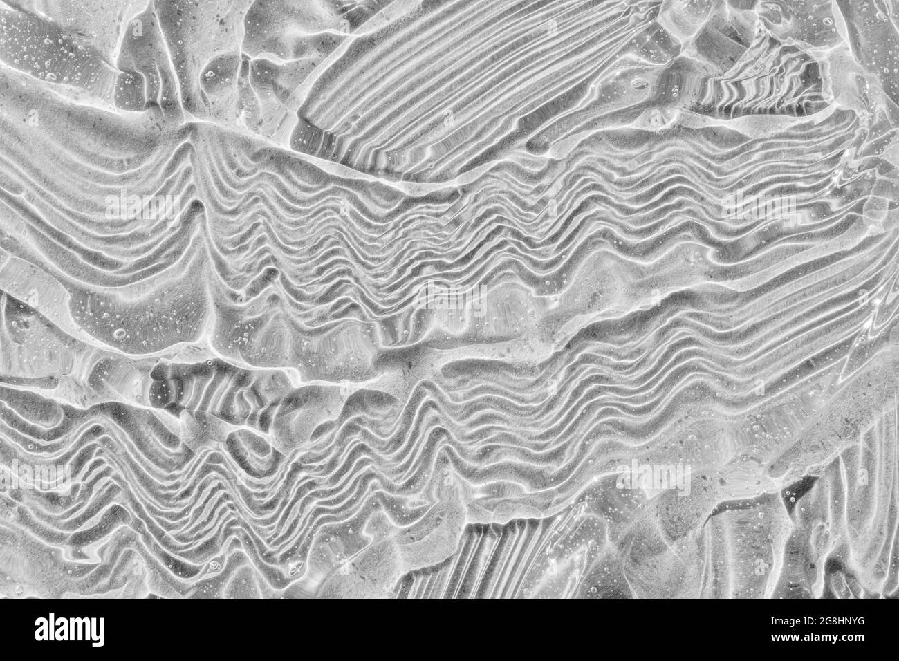 Texture transparent gel serum Black and White Stock Photos & Images - Alamy
