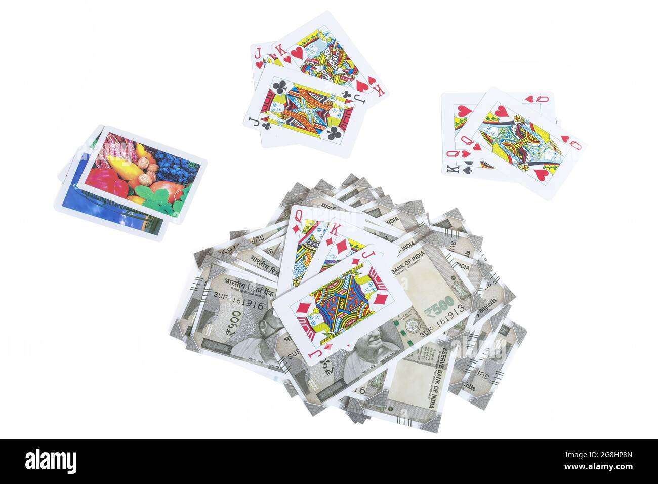 Top view of poker cards scattered on an isolated white background with ...