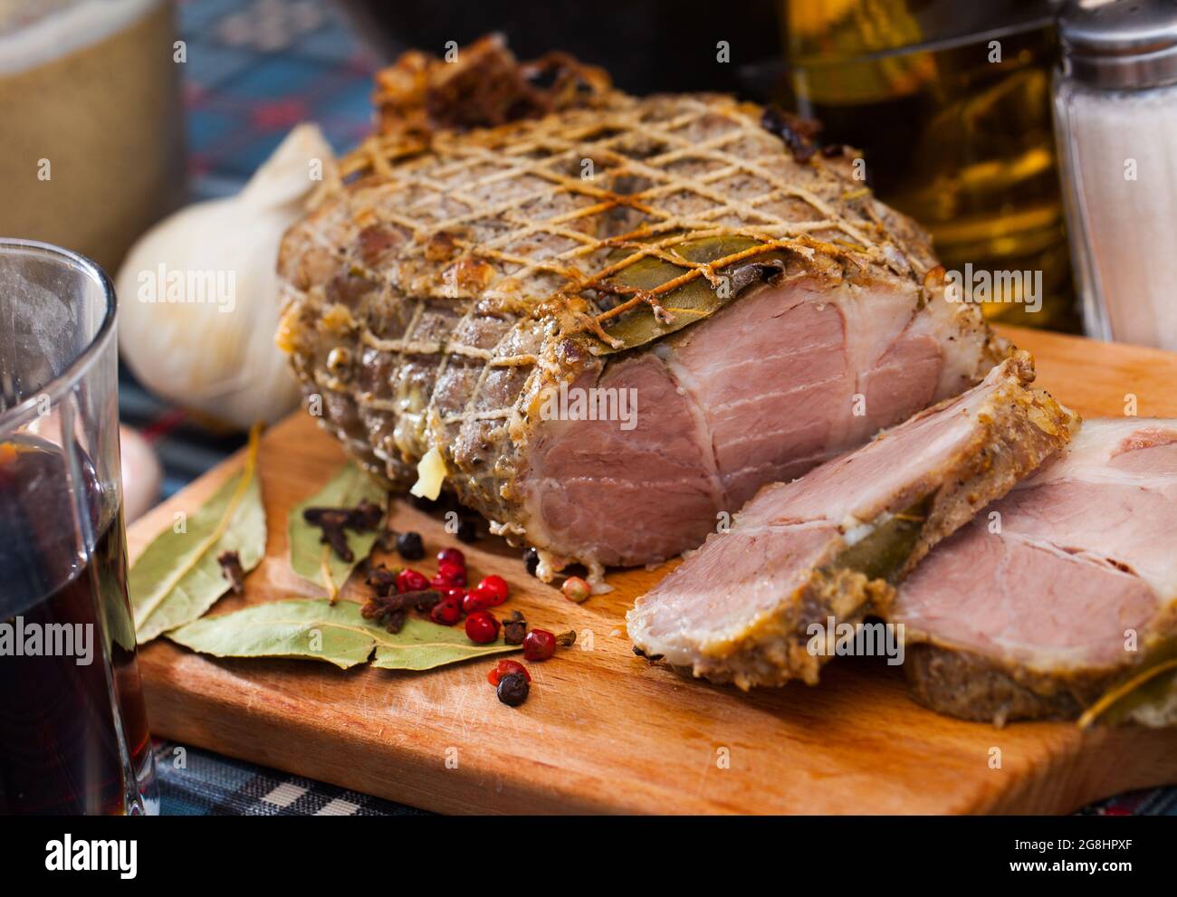 Pork baked in oven in large piece Stock Photo - Alamy