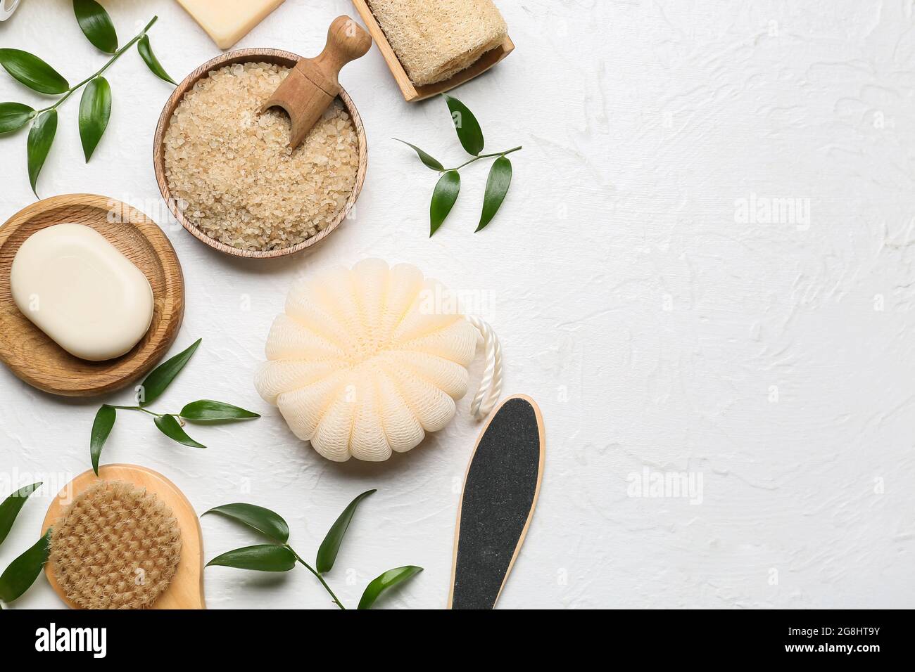 Different bath supplies on light background Stock Photo - Alamy