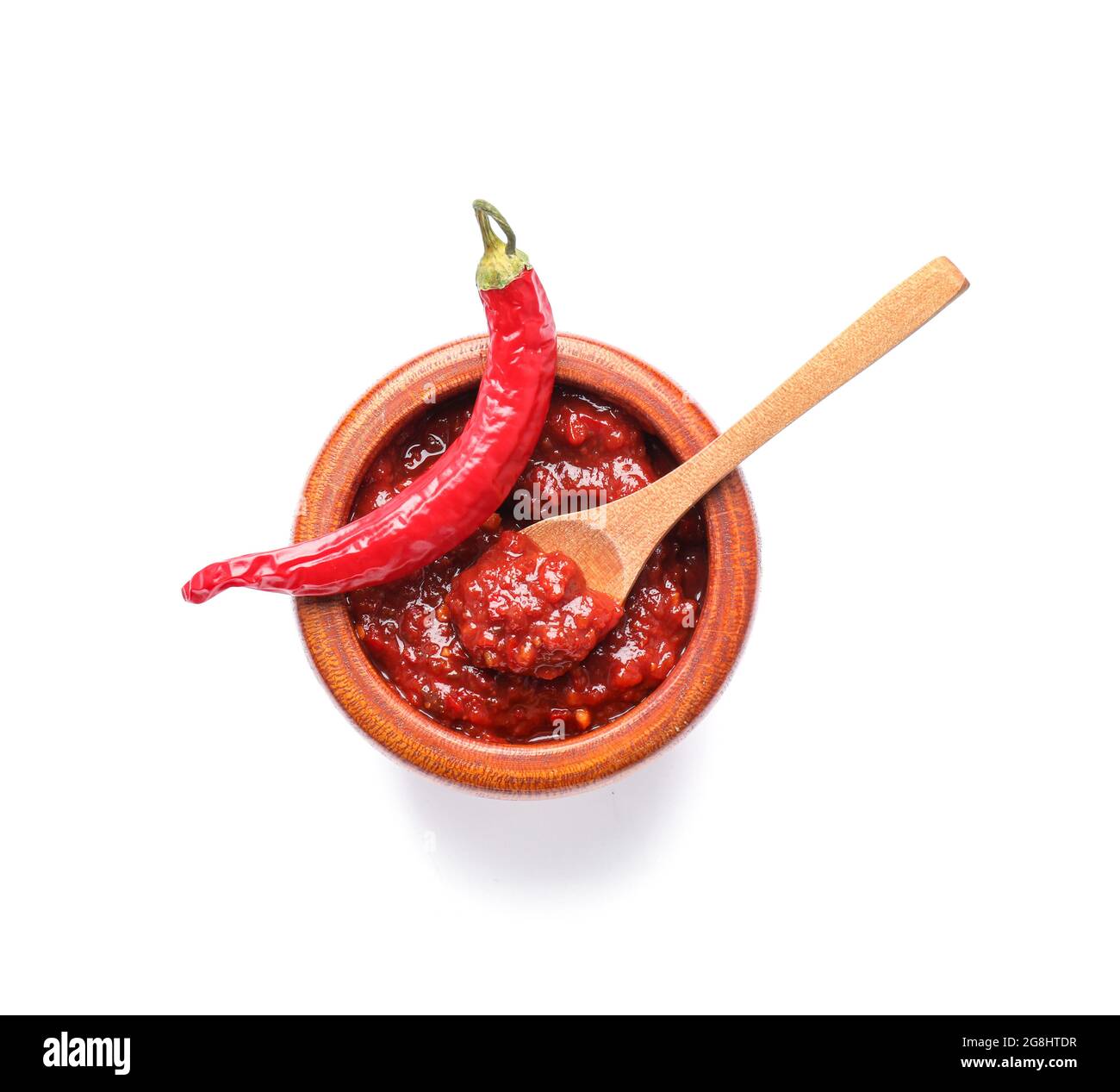Bowl of chili sauce on white background Stock Photo - Alamy