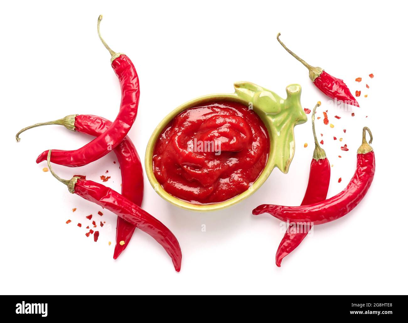 Bowl of chili sauce on white background Stock Photo - Alamy